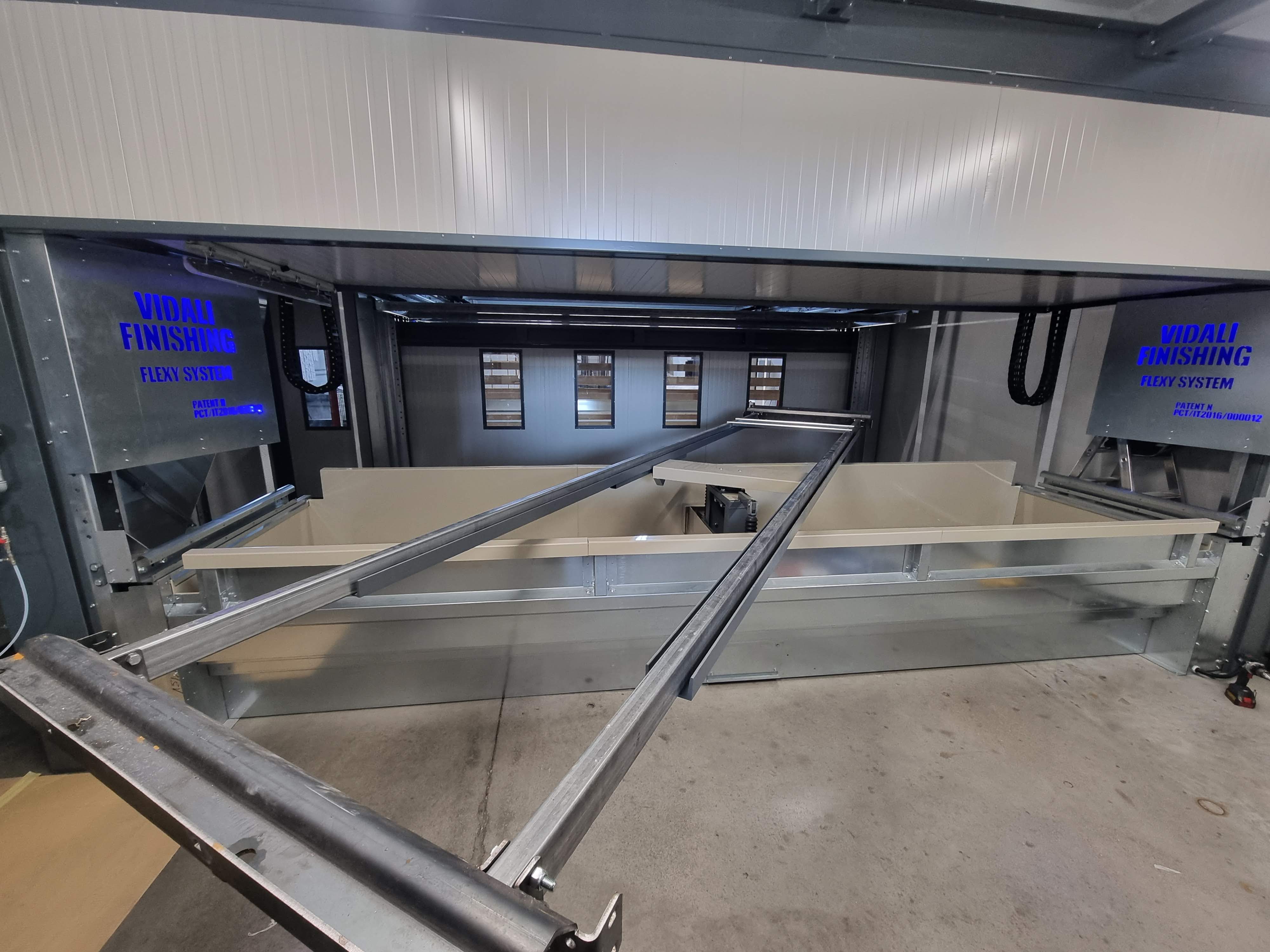 Automatic horizontal coating storage Mod. Flexy | Vidali Finishing